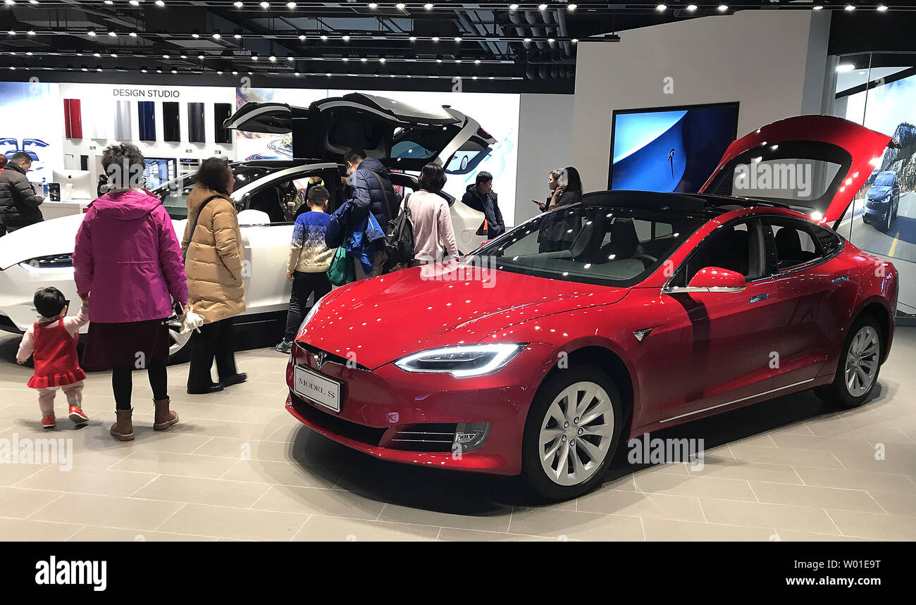 Chinese explore Tesla's new flagship showroom in Beijing on February 24 ...
