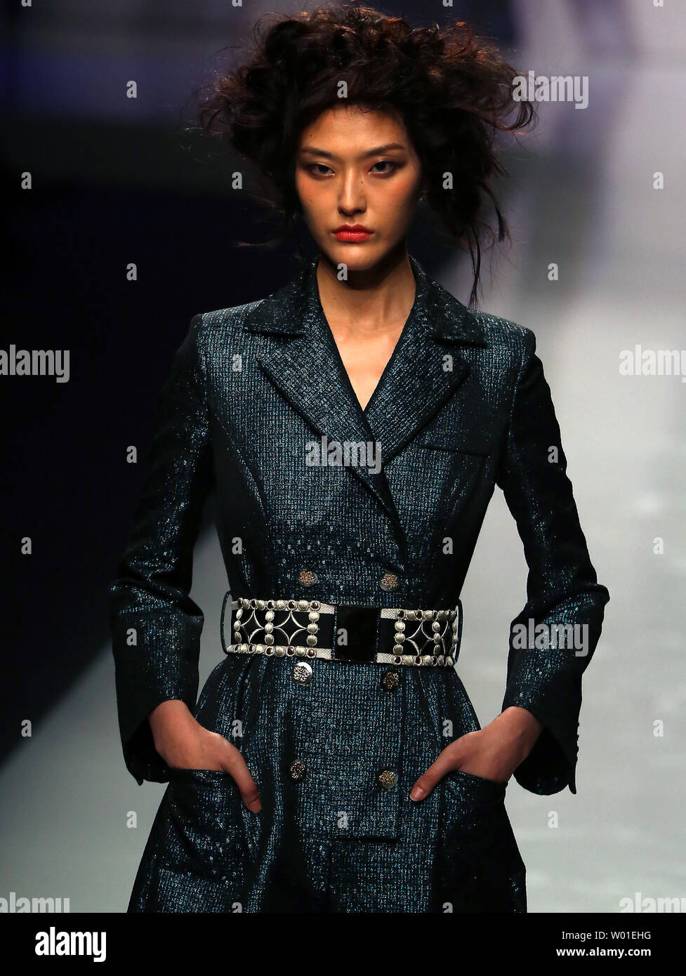 Chinese models wear clothing by designer Chen during the annual China ...