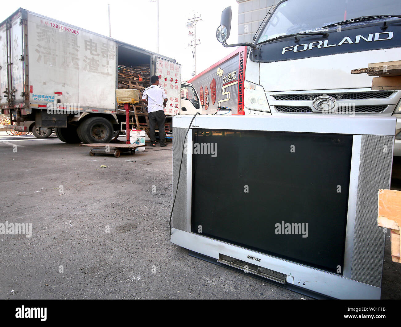 A discarded television is dropped off at a recycling depot in downtown ...
