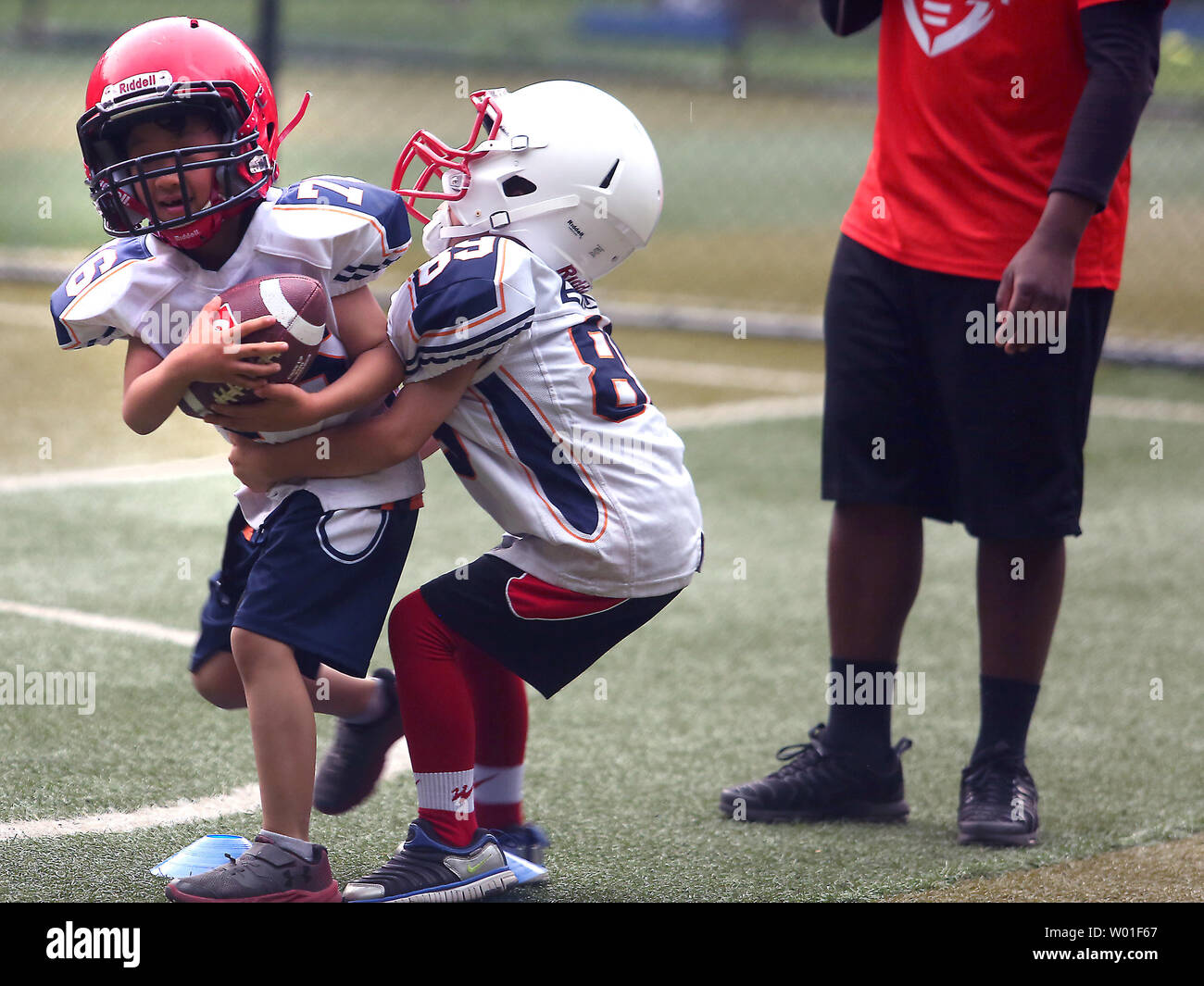 Little Kids Playing American Football