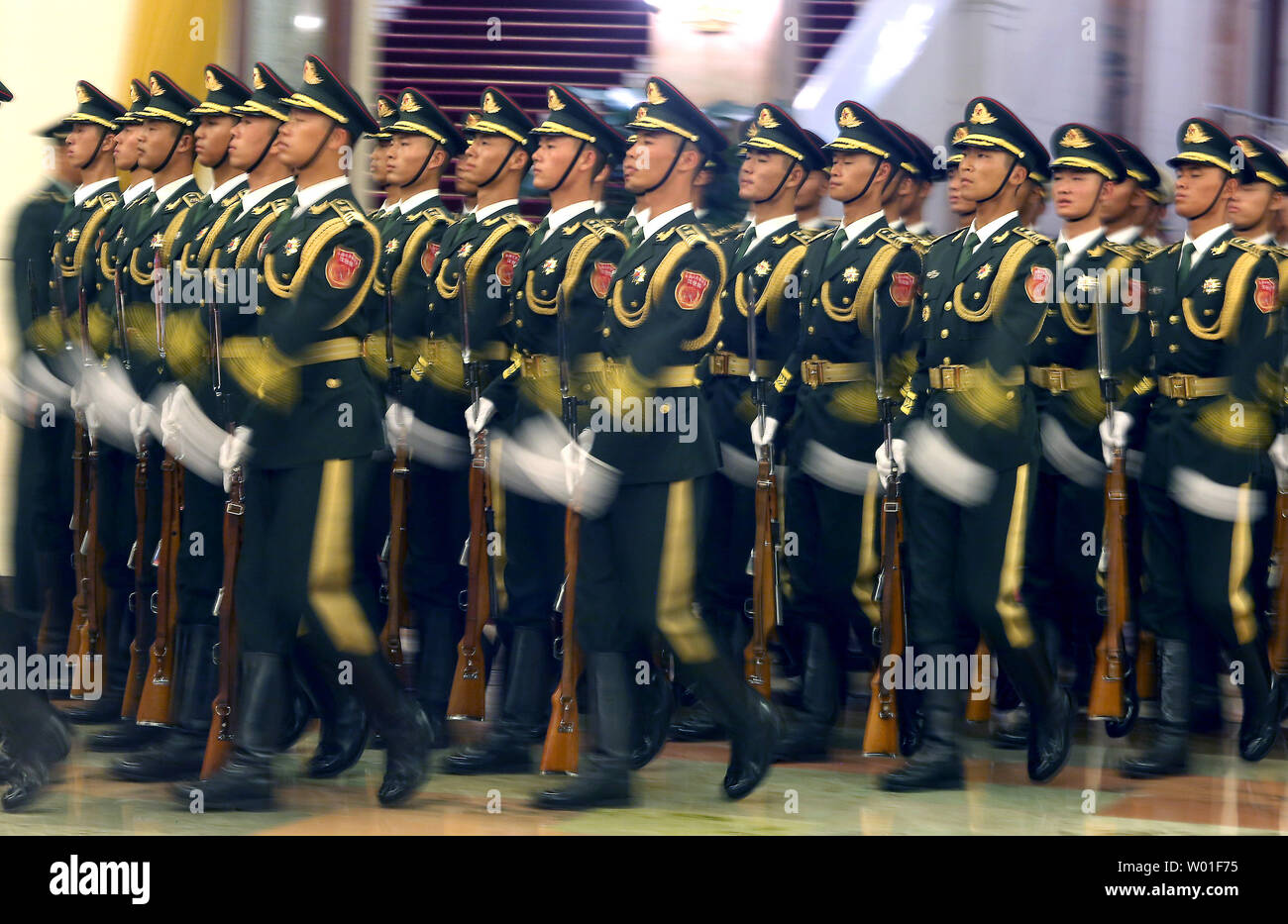Peoples' Liberation Army (PLA) soldiers arrive to perform honor guard ...