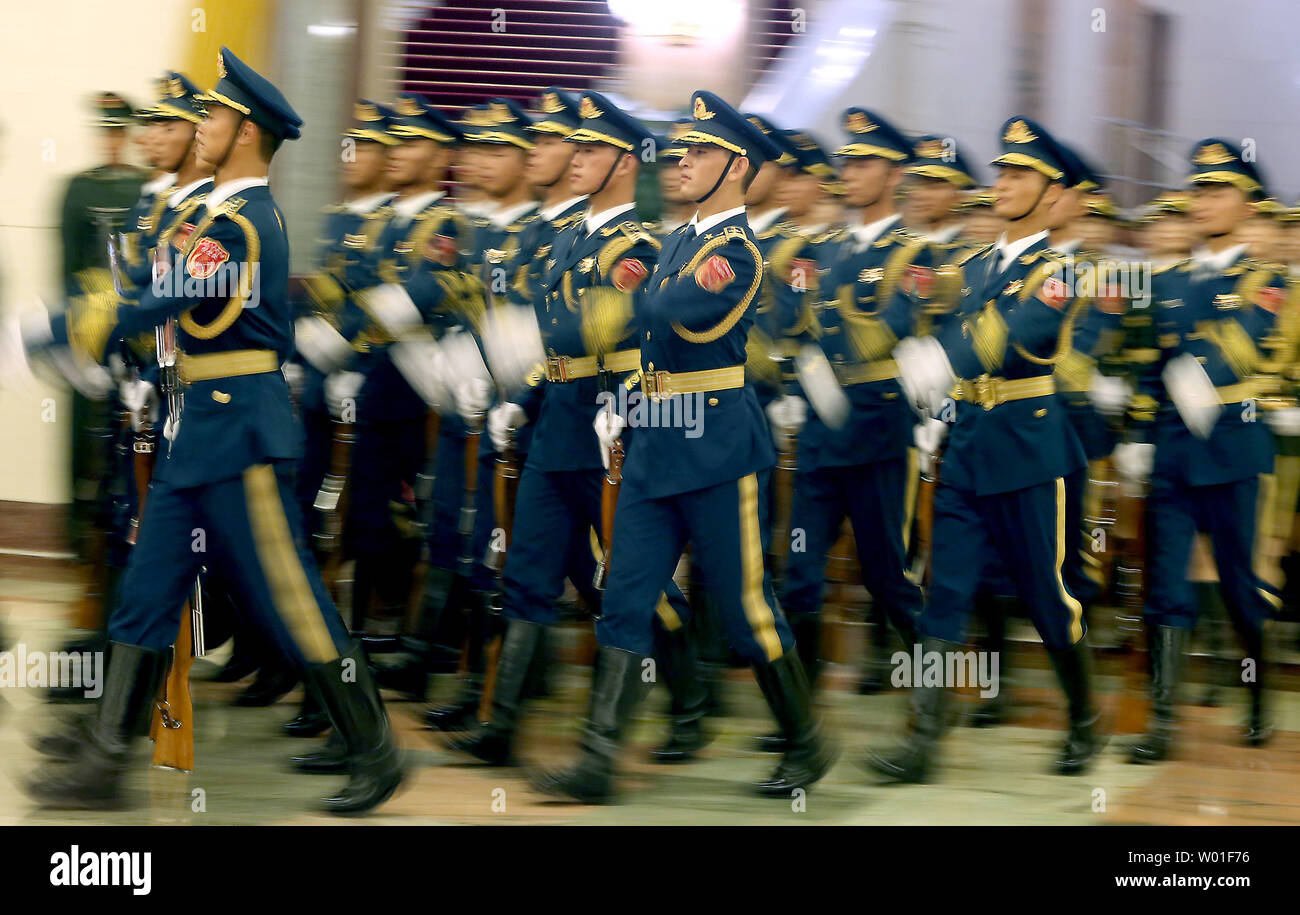 Peoples' Liberation Army (PLA) soldiers arrive to perform honor guard ...