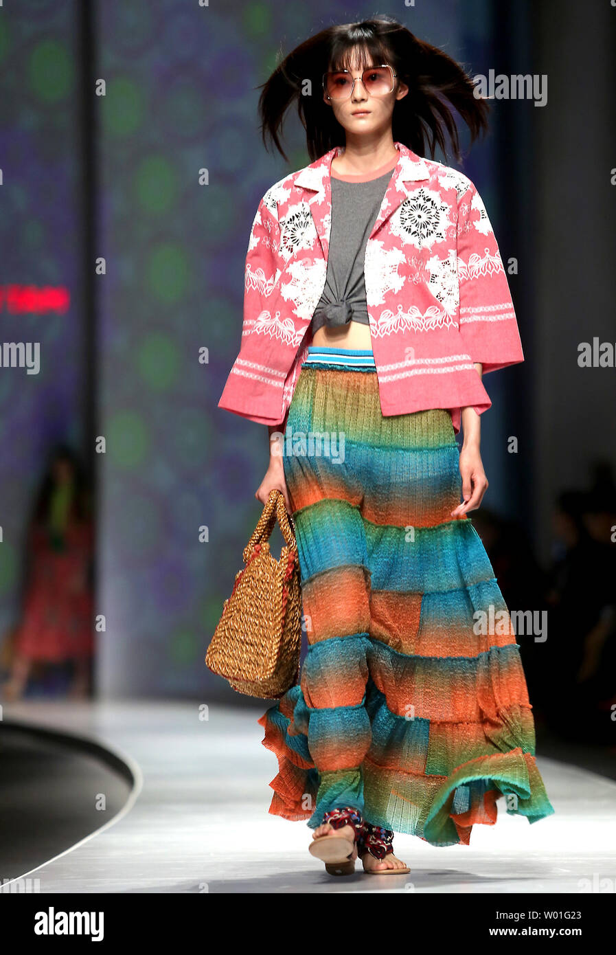 Models wear the latest designs from Vivienne Tam during the annual ...