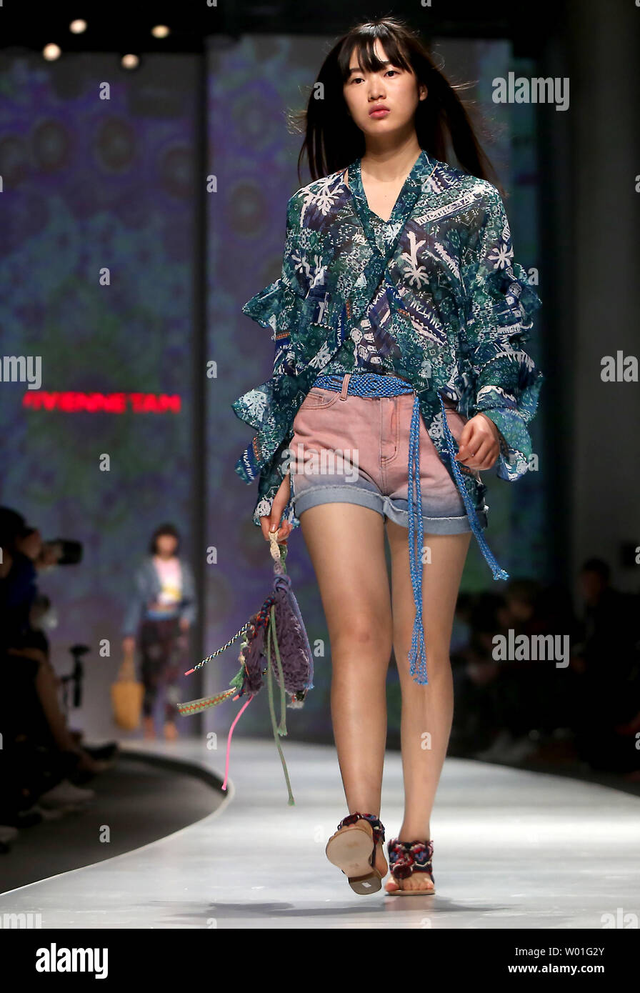 Models wear the latest designs from Vivienne Tam during the annual ...