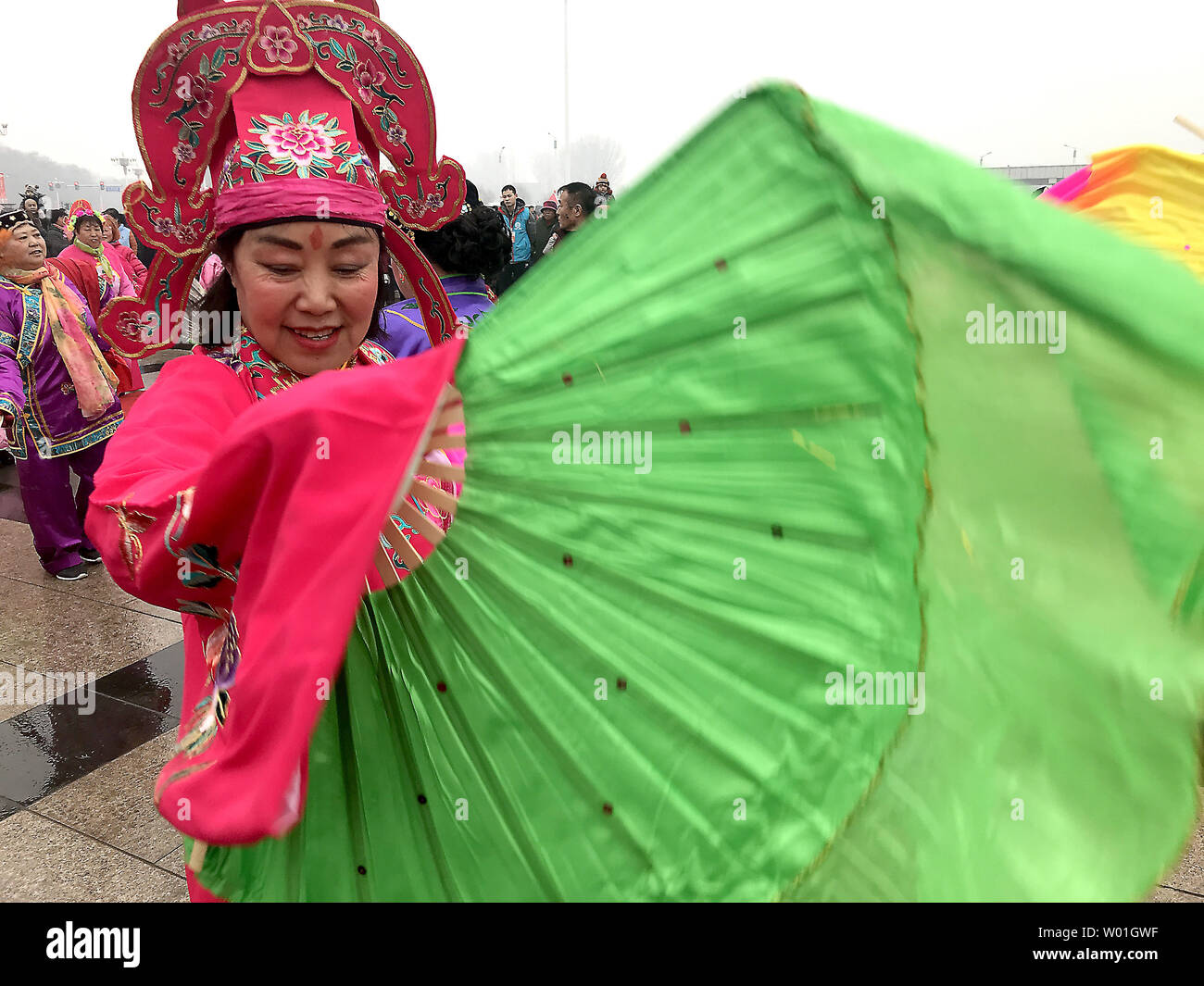 Chinese visit a cultural festival with traditional performances by ...