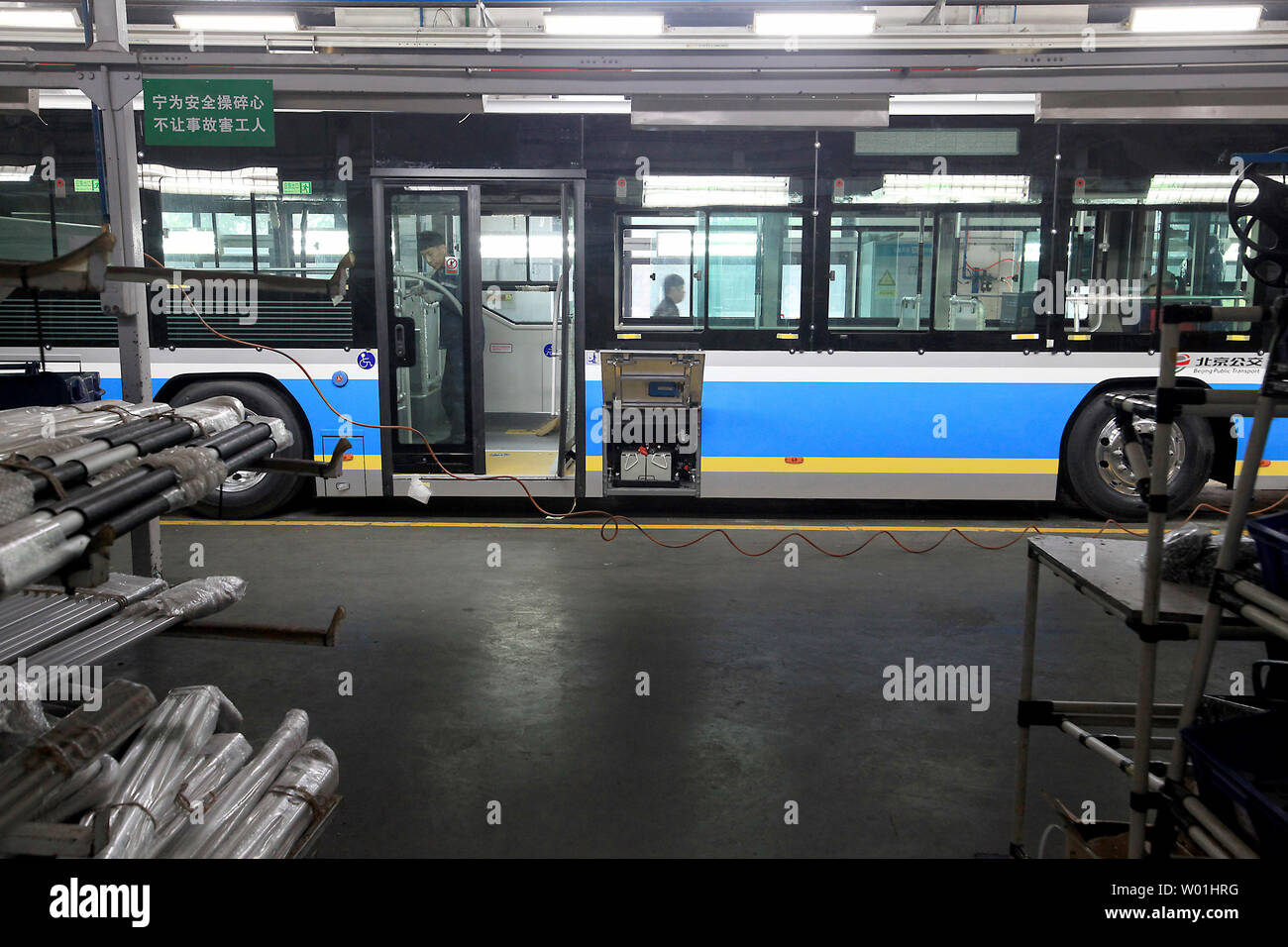 China's Foton AUV electric buses are built on an assembly line at their ...