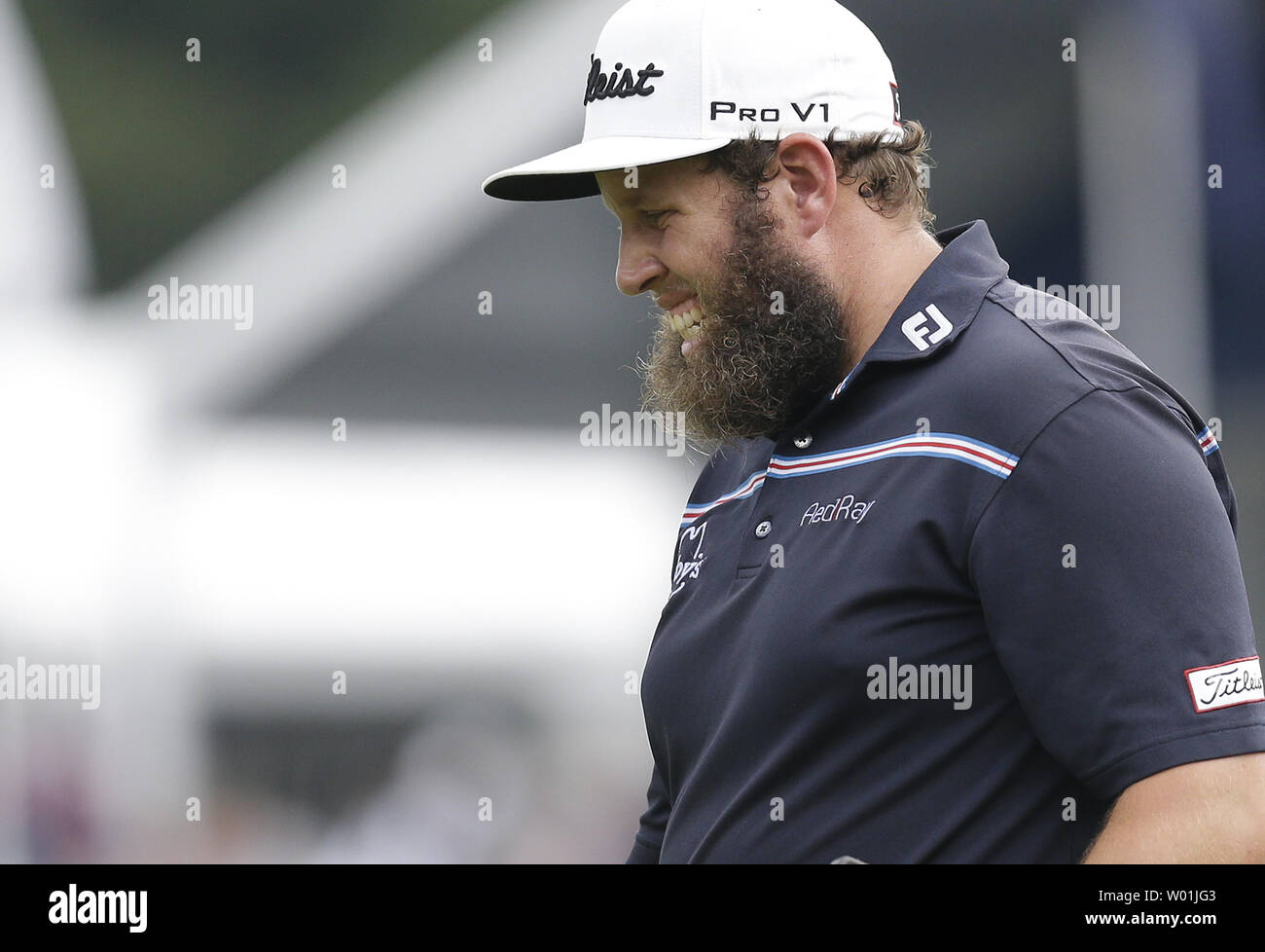 Andrew "Beef" Johnston stands on the 18th green in the final round at ...