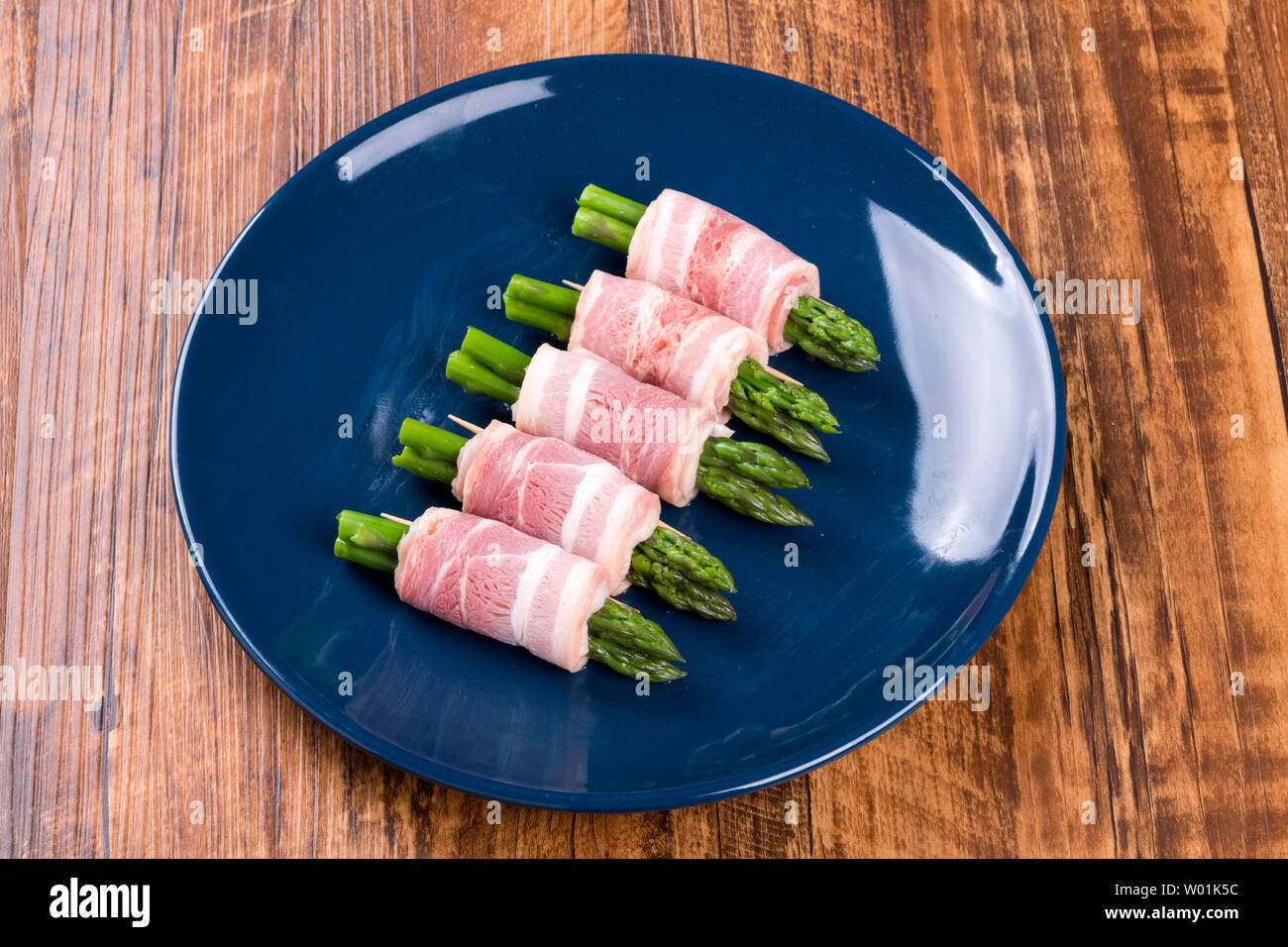 Bacon asparagus roll Stock Photo - Alamy