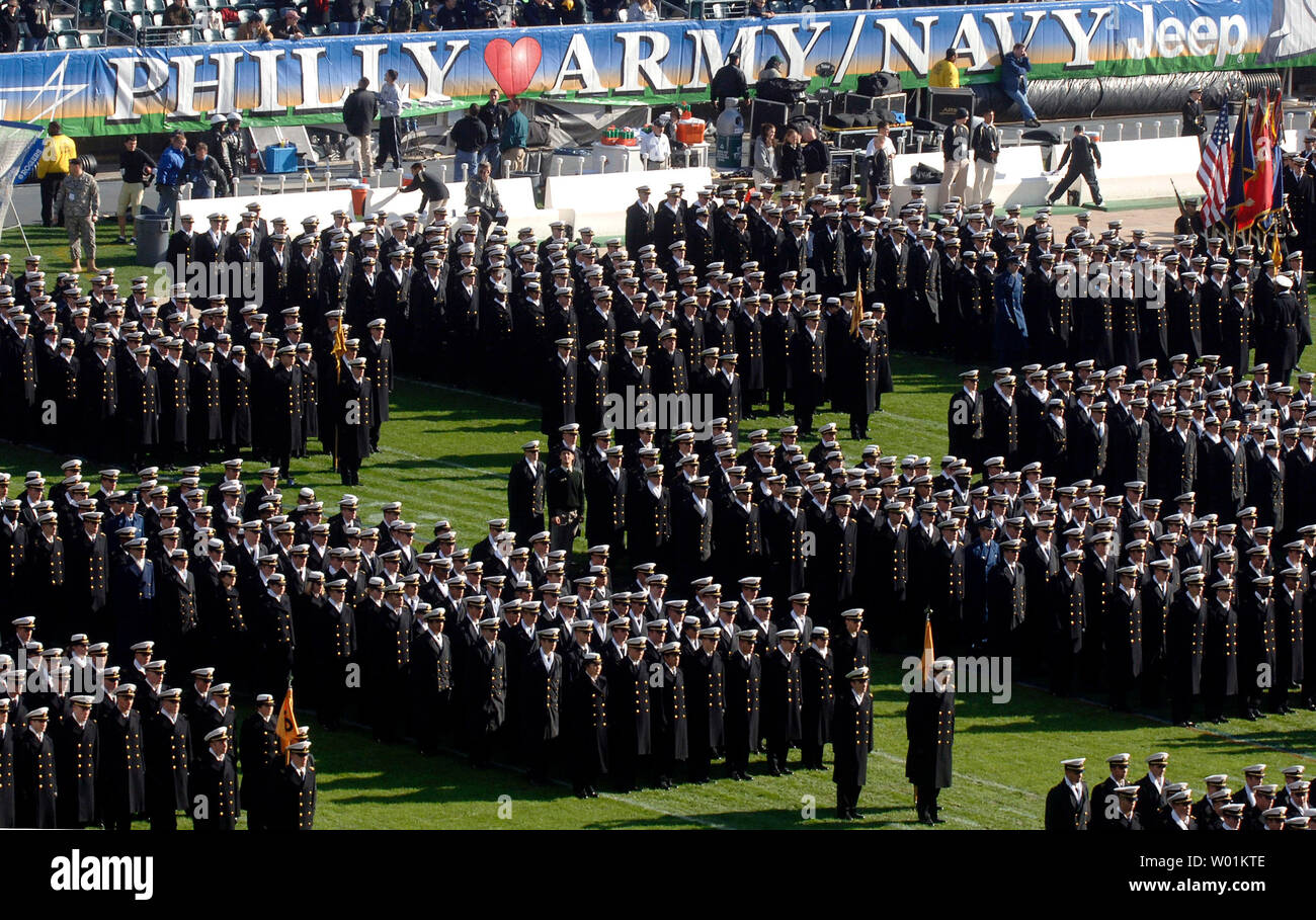 Naval Academy midshipman line up on the field for their introduction ...