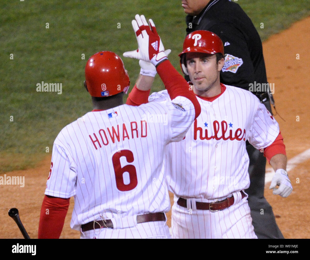 Philadelphia Phillies Ryan Howard congratulates teammate Chase Utley ...