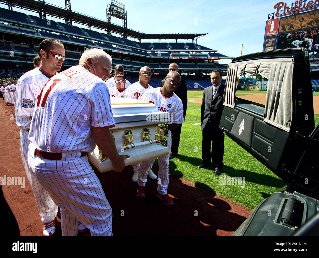 Charlie Manuel, left front, along with Phillies' team members carry the ...