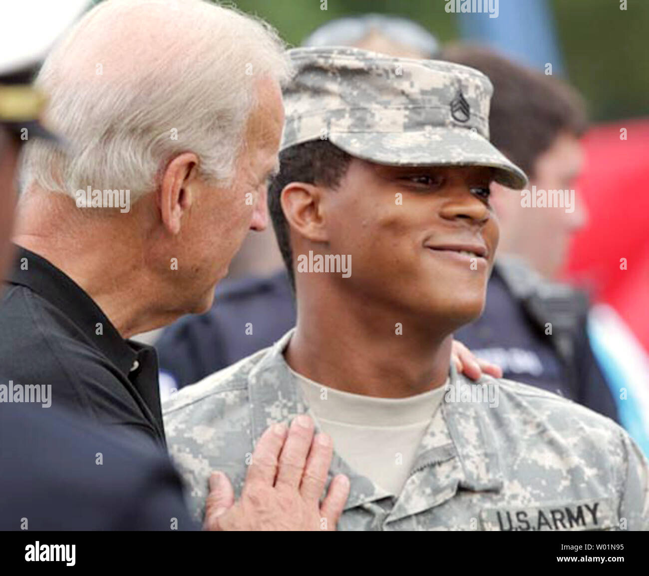 Vice-President Joe Biden gestures as he talks to Army Staff Sgt. James ...