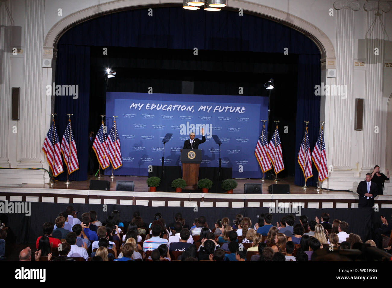 U.S. President Barack Obama waves to the students following his Back To ...