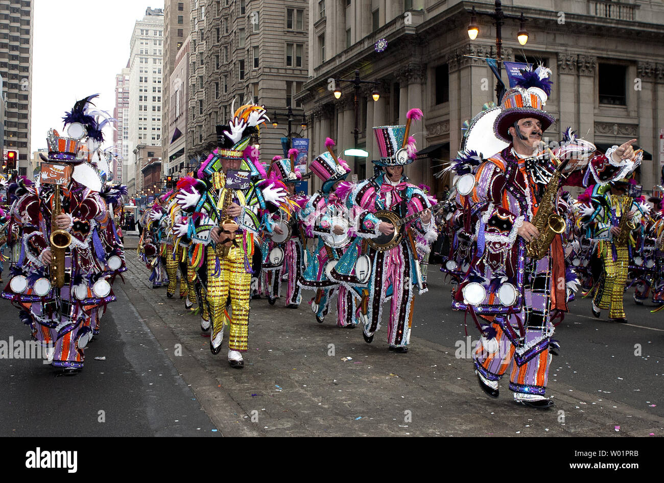 Members of the Kensington String Band members strut down Broad Street ...