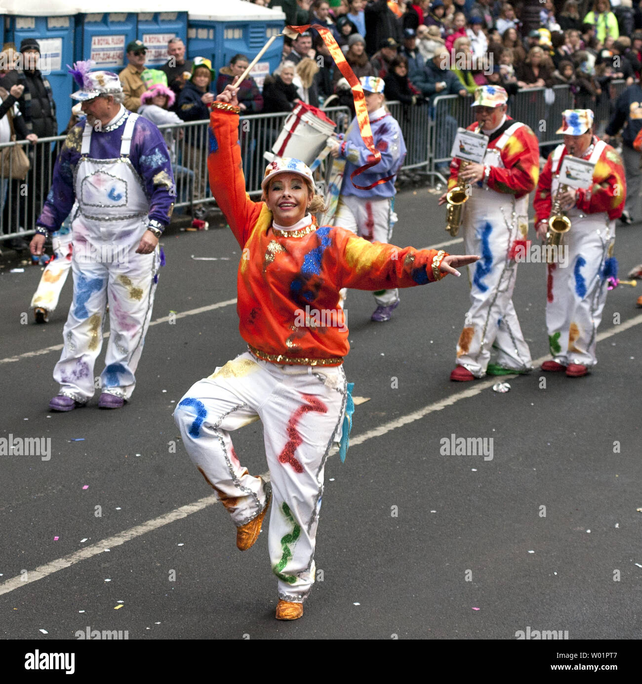 Members of the Broomall String Band strut down Broad Street in downtown ...