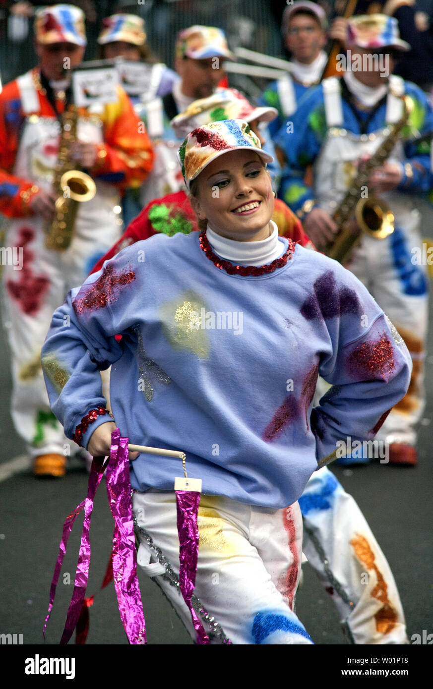 A member of the Broomall String Band struts down Broad Street in ...