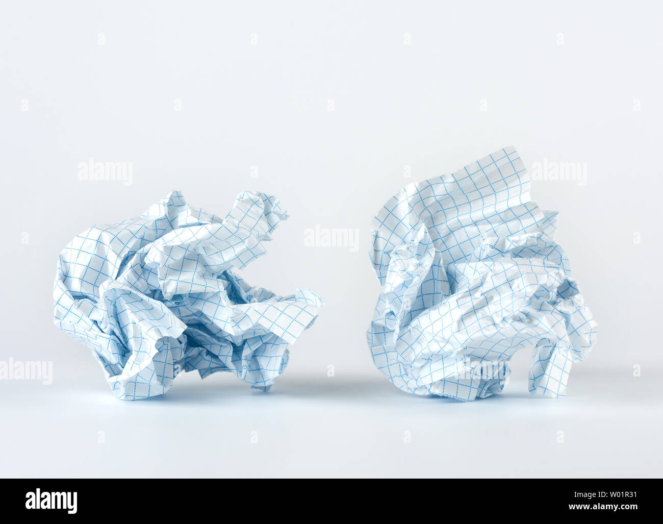 crumpled blank white sheet of paper into the cell from a school ...