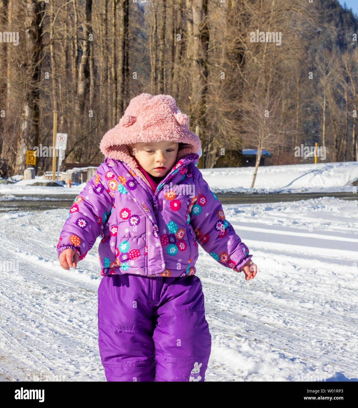 20 months old baby enjoying the nice weather outside. Toddler girl ...