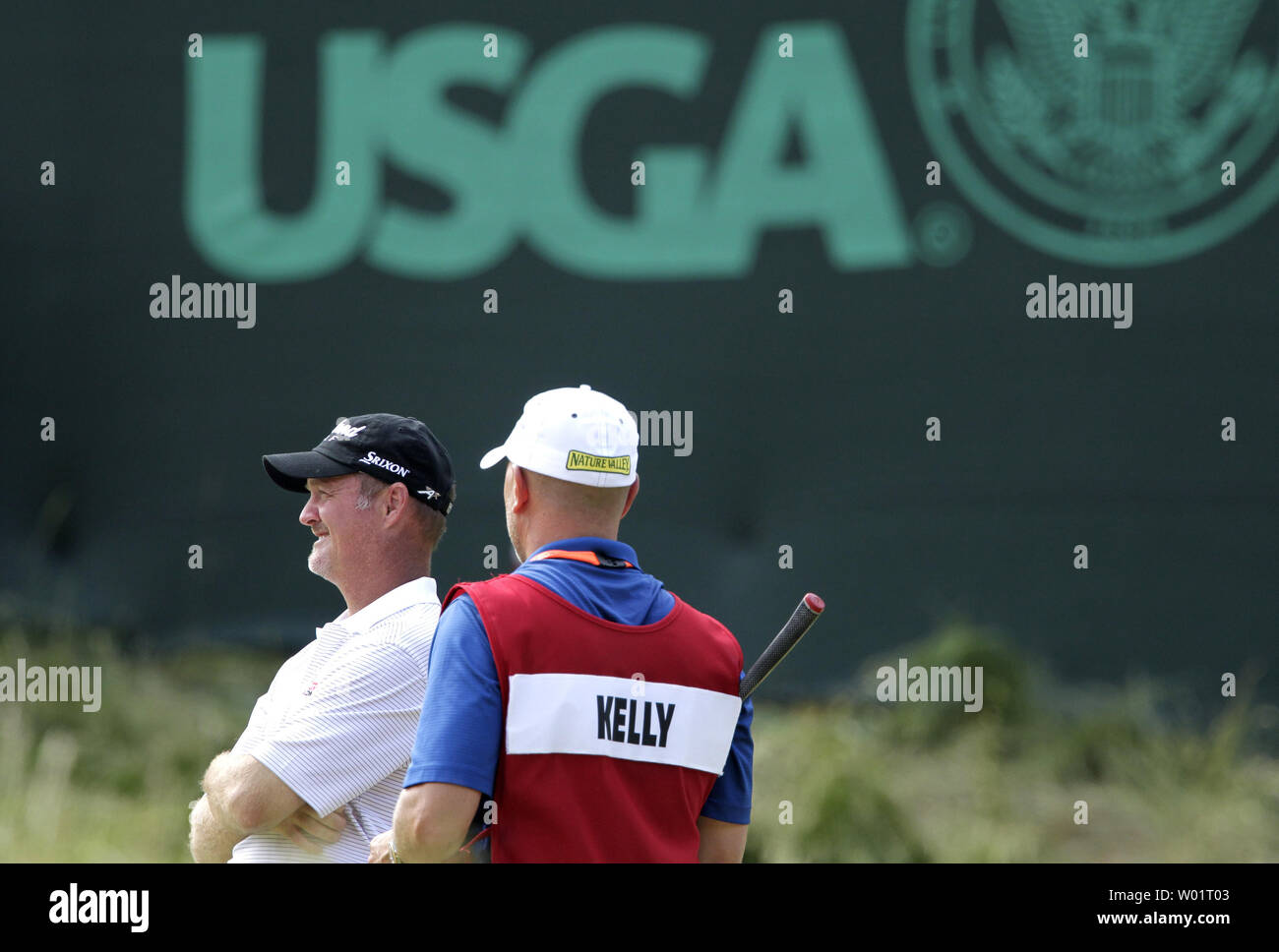 Jerry Kelly and Caddie Eric Meller stand near the 17th green in the ...