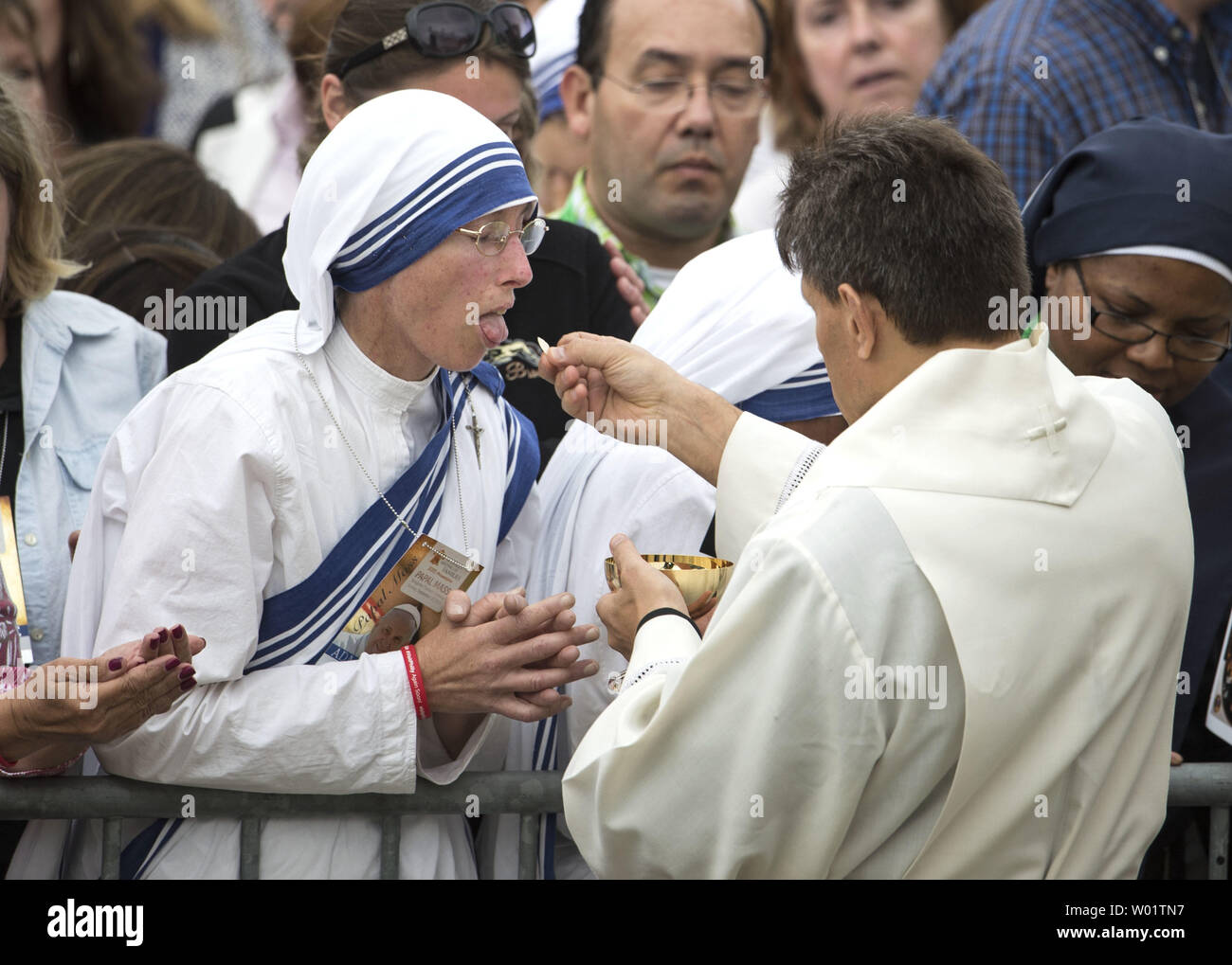 Receives communion hi-res stock photography and images - Alamy