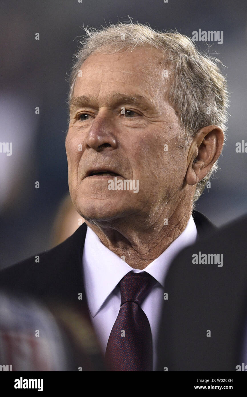 Former president George Bush stands on the sidelines prior to an NFL ...