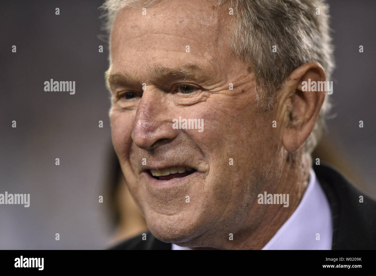 Former president George Bush stands on the sidelines prior to an NFL ...