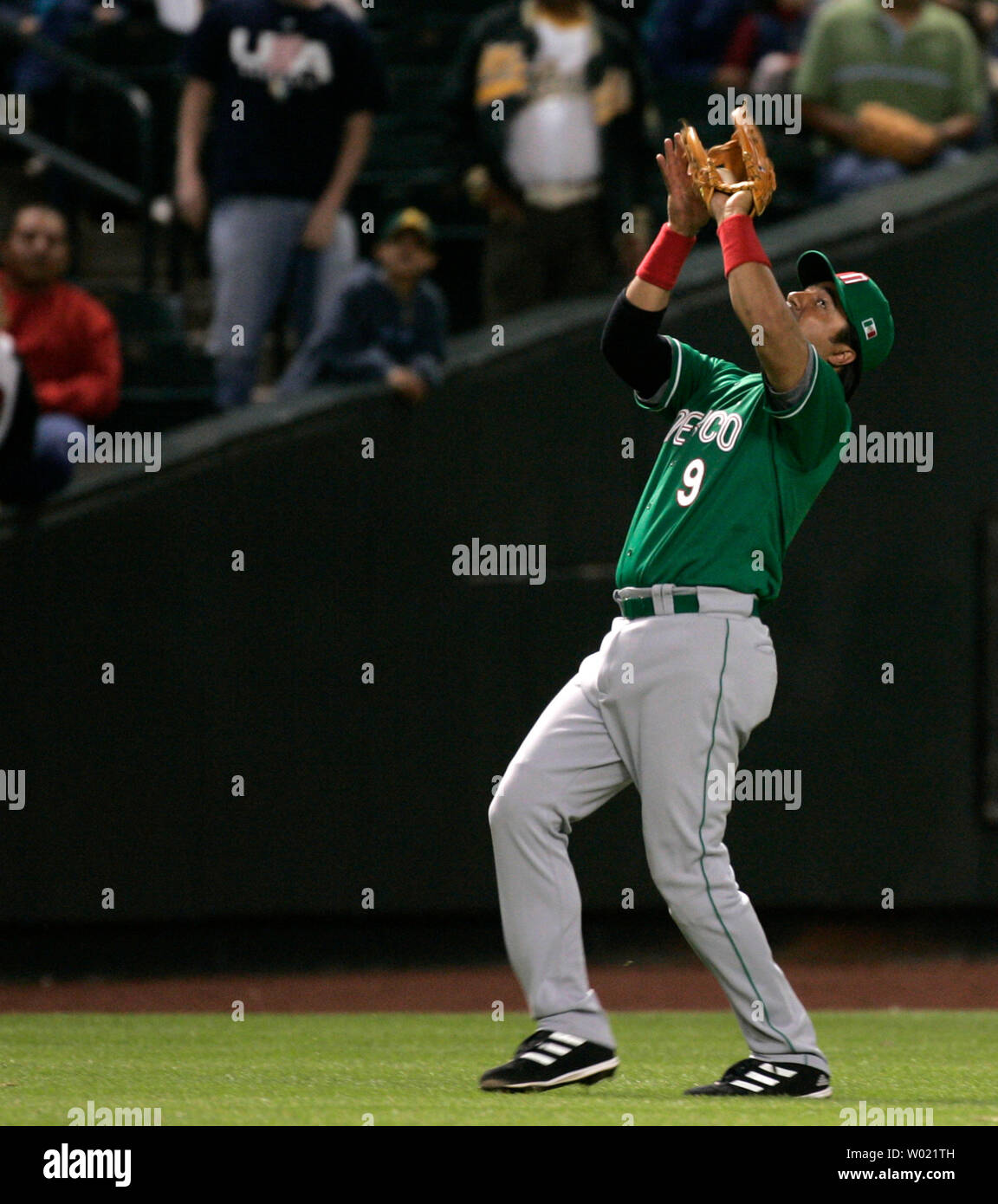 Team Mexico's Vinnie Castilla catches a short left field pop up by Team ...