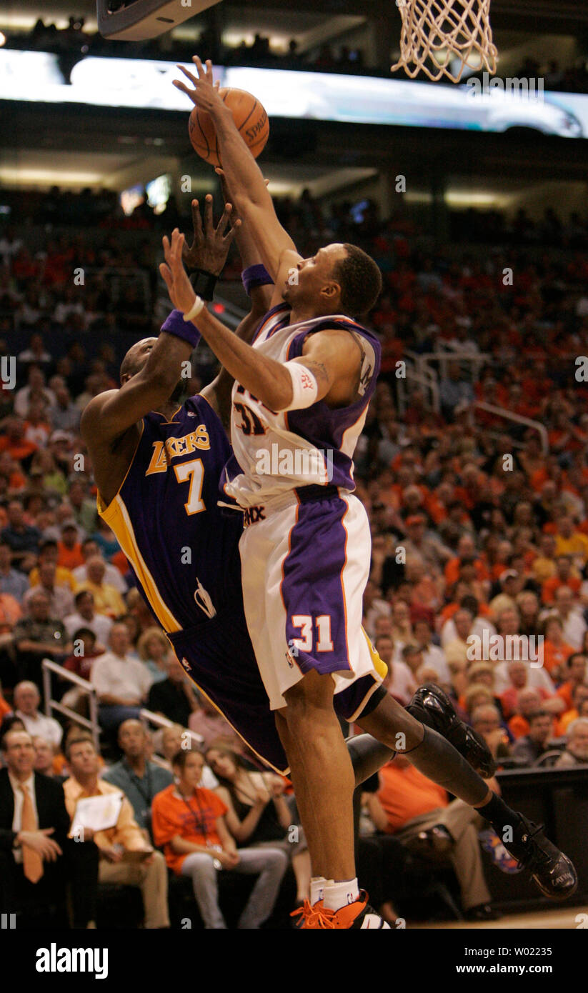 Los Angeles Lakers Lamar Odom is fouled by Phoenix Suns Shawn Marion in ...