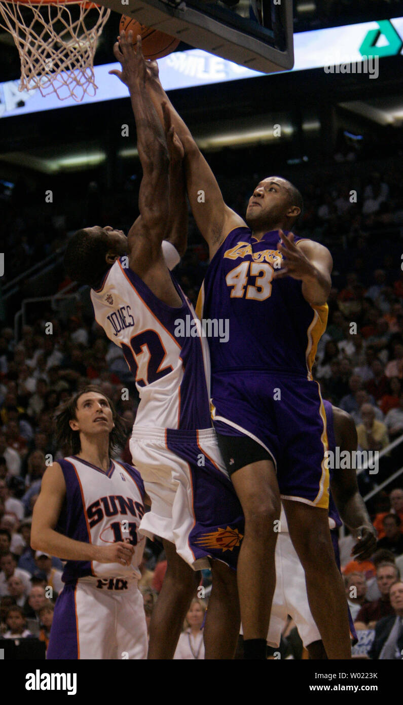 Los Angeles Lakers Brian Cook drops a dunk in over Phoenix Suns James ...