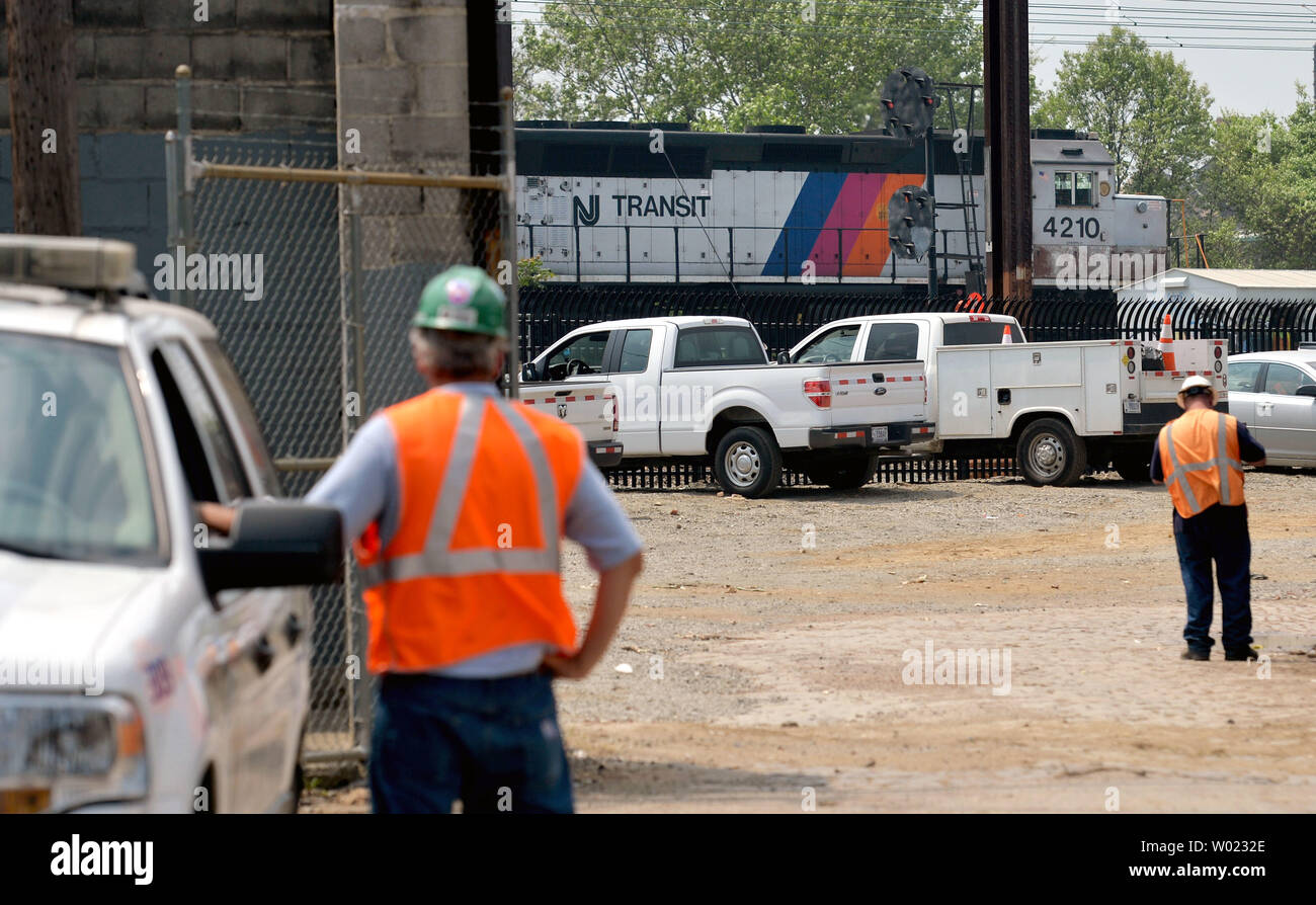 An New Jersey Transit computer train travels through the site of last ...