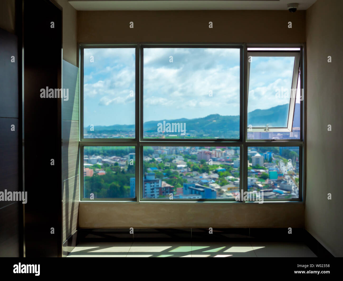 Cityscape, view from glass window in the building, loneliness in the ...