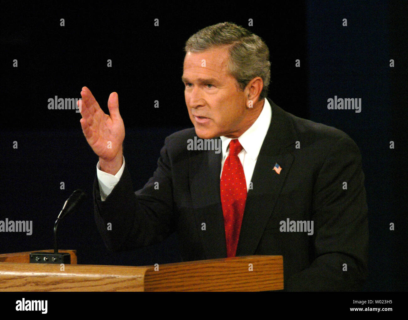 President George W. Bush makes a point during presidential debate with ...