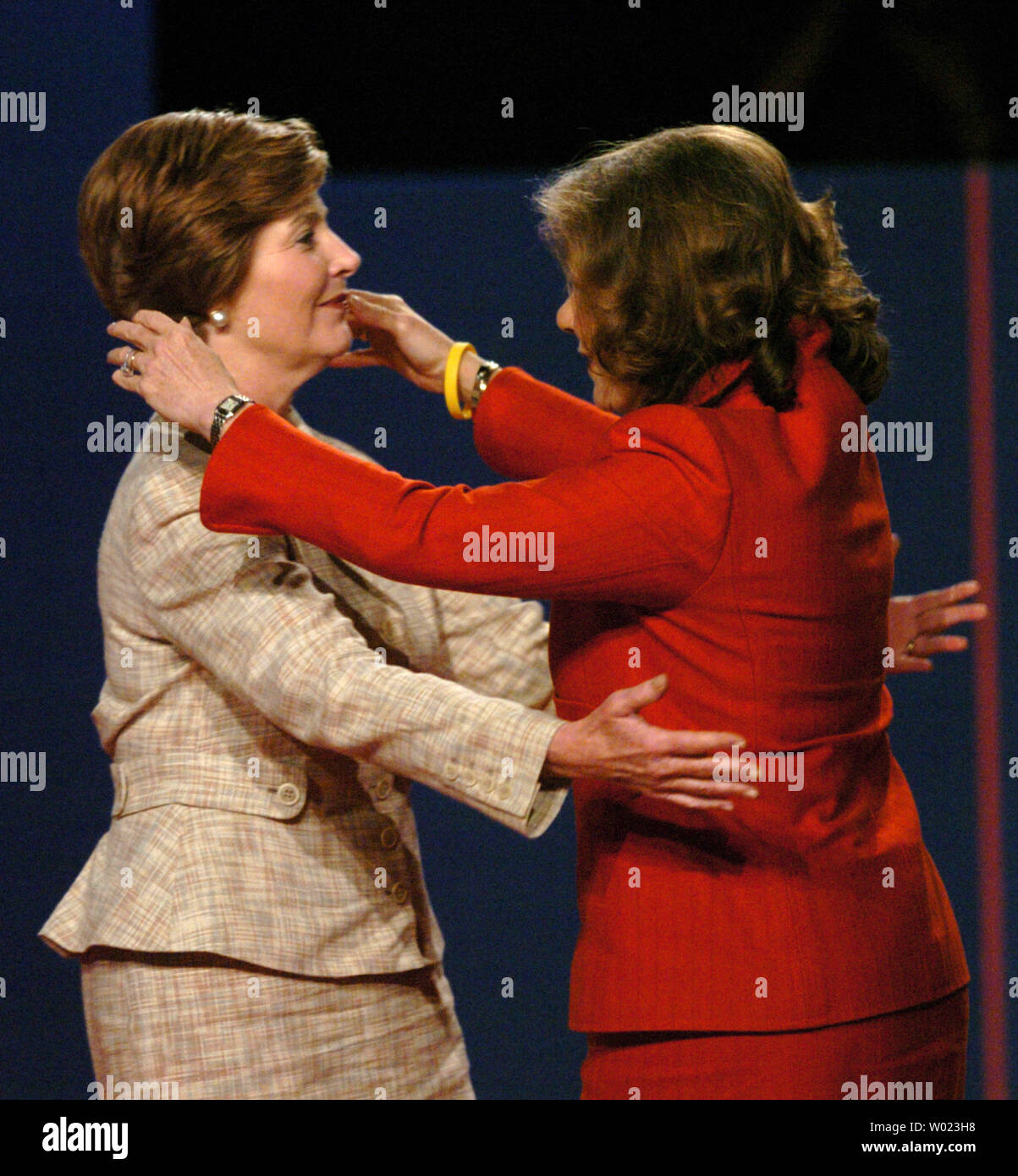 First Lady Laura Bush (L) hugs Teresa Heinz Kerry, wife of Sen. John ...