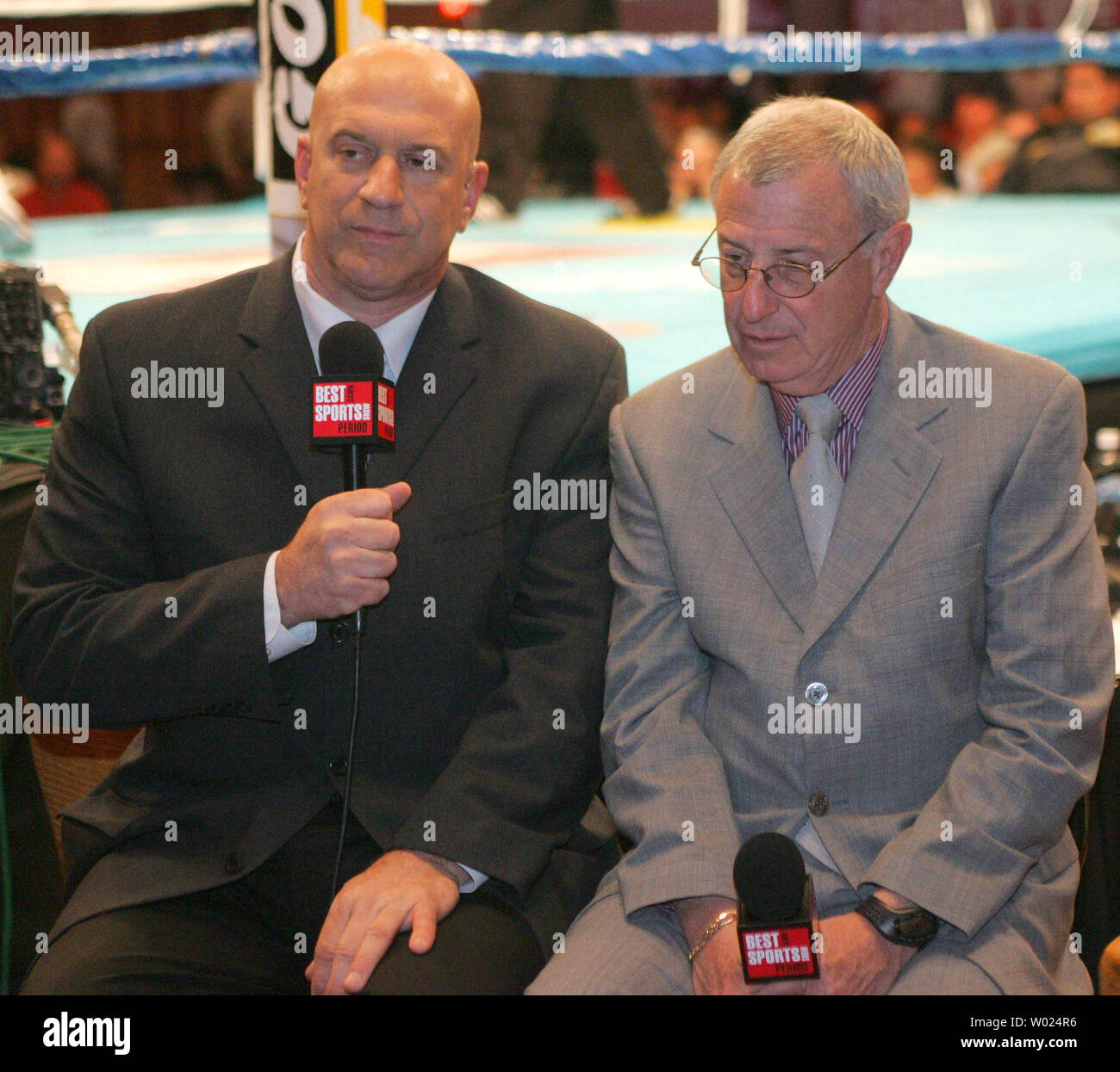 ESPN announcers Rich Mirada and Barry Tompkins wait for the Riddick ...