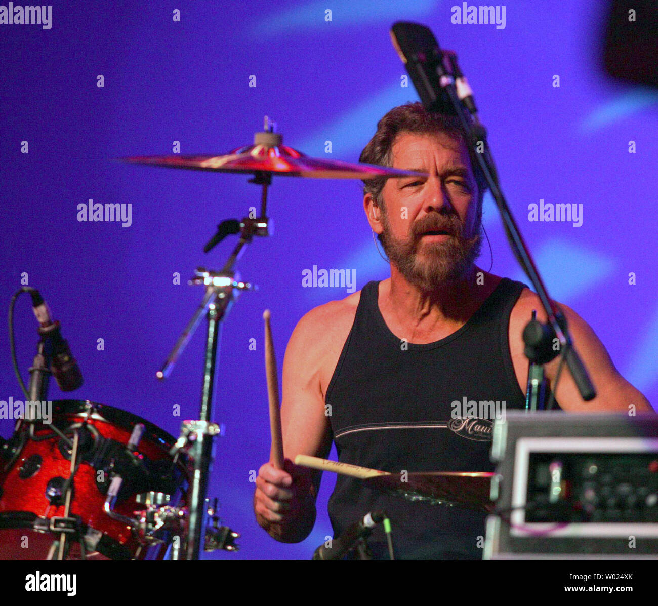 Drummer Doug "Cosmo" Clifford of Creedence Clearwater Revival performs ...