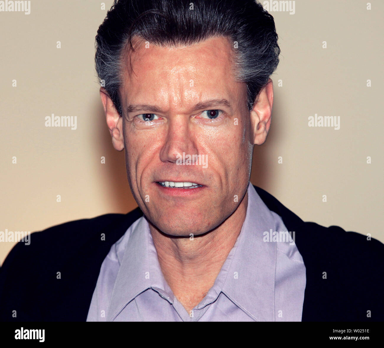 Country singer Randy Travis appears backstage prior to his concert at ...