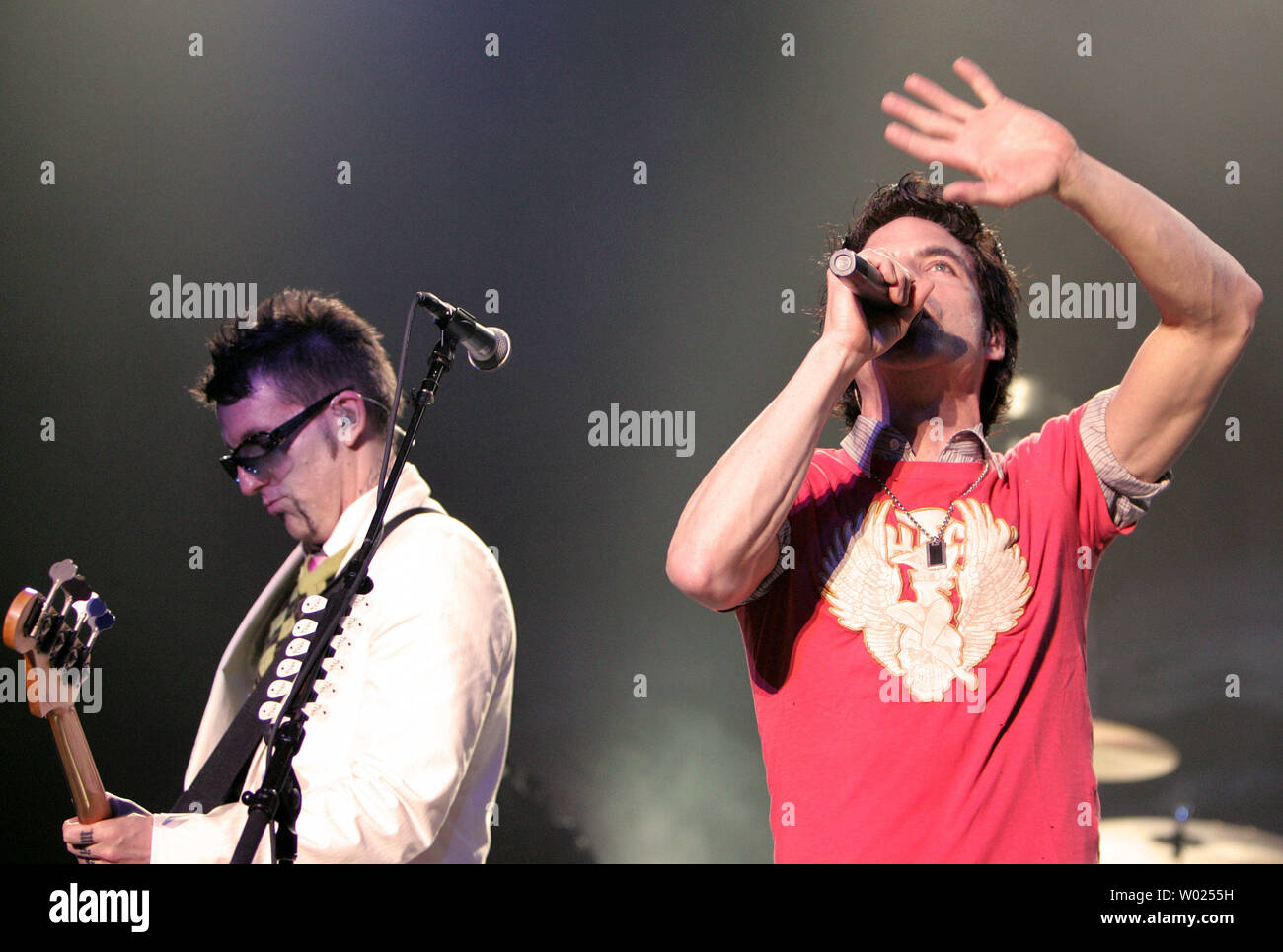 Johnny Colt (L) and Pat Monahan of the rock group Train appear in ...