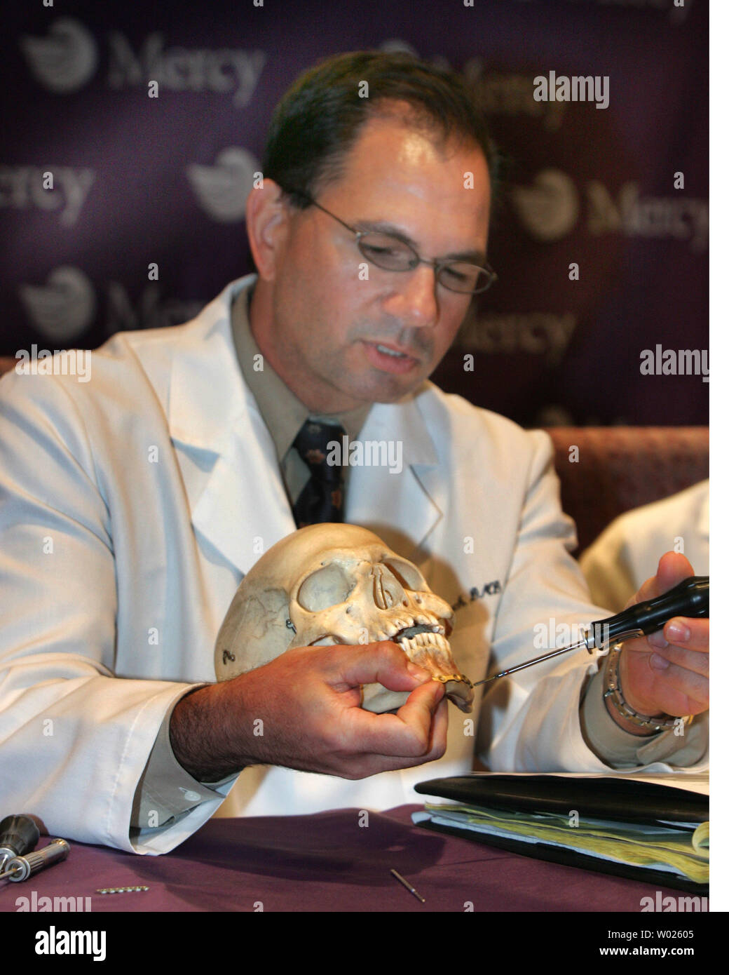 Dr. Daniel W. Pituch of Mercy Hospital demonstrates the surgical ...