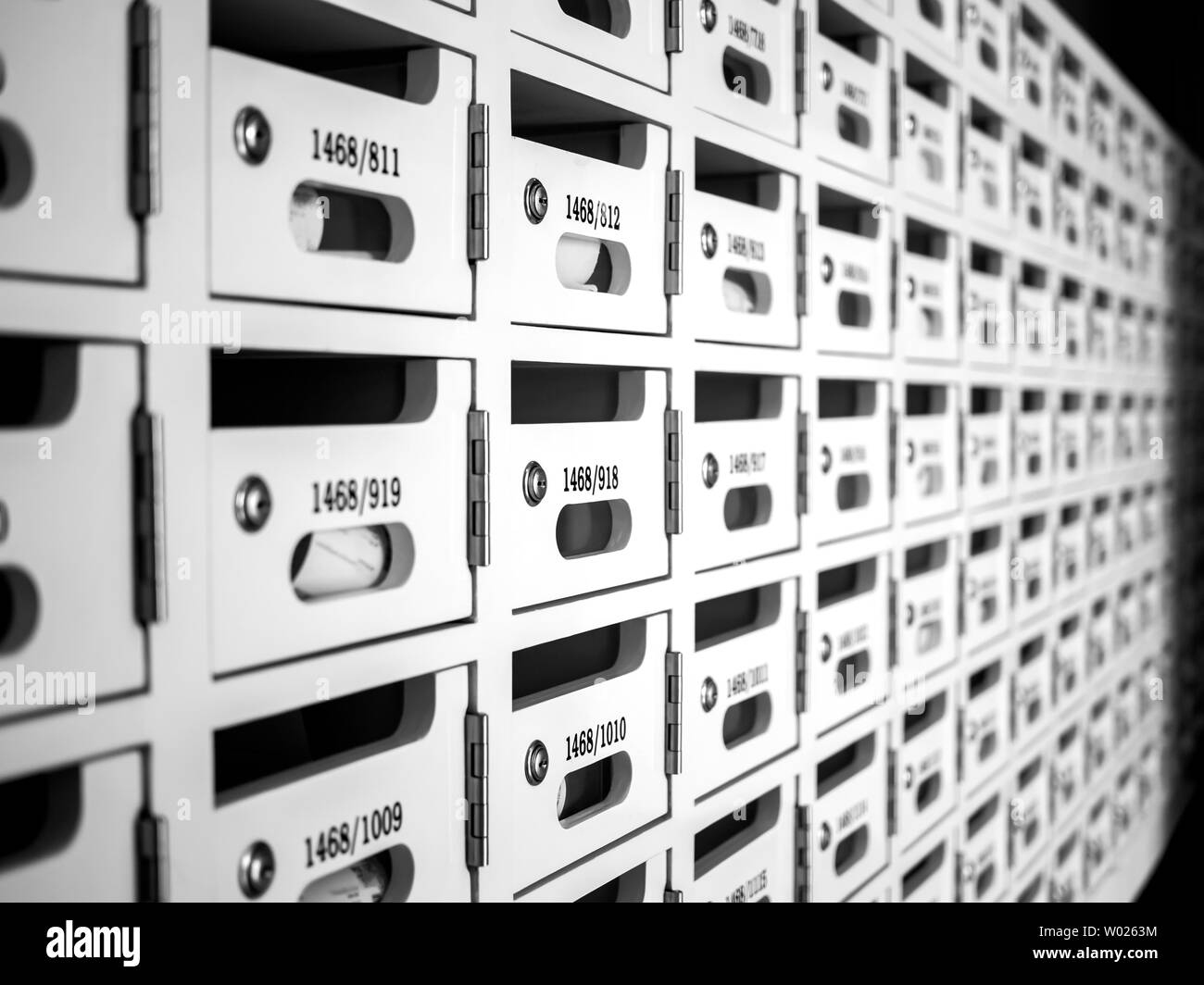 Mail post boxes in apartment hi-res stock photography and images - Alamy