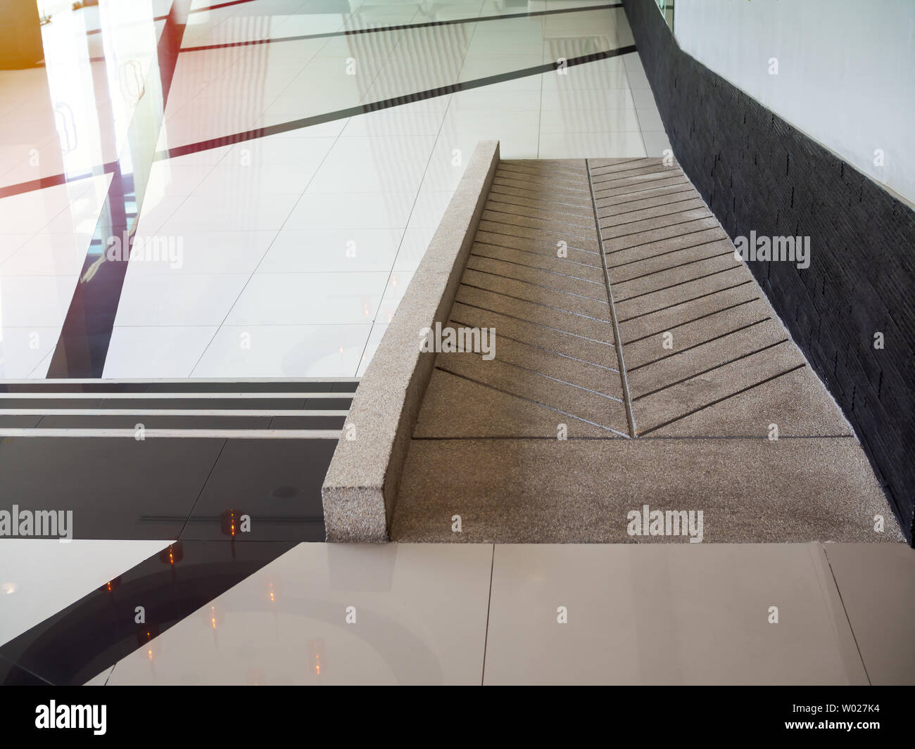 Concrete ramp way for support wheelchair disabled people inside the ...