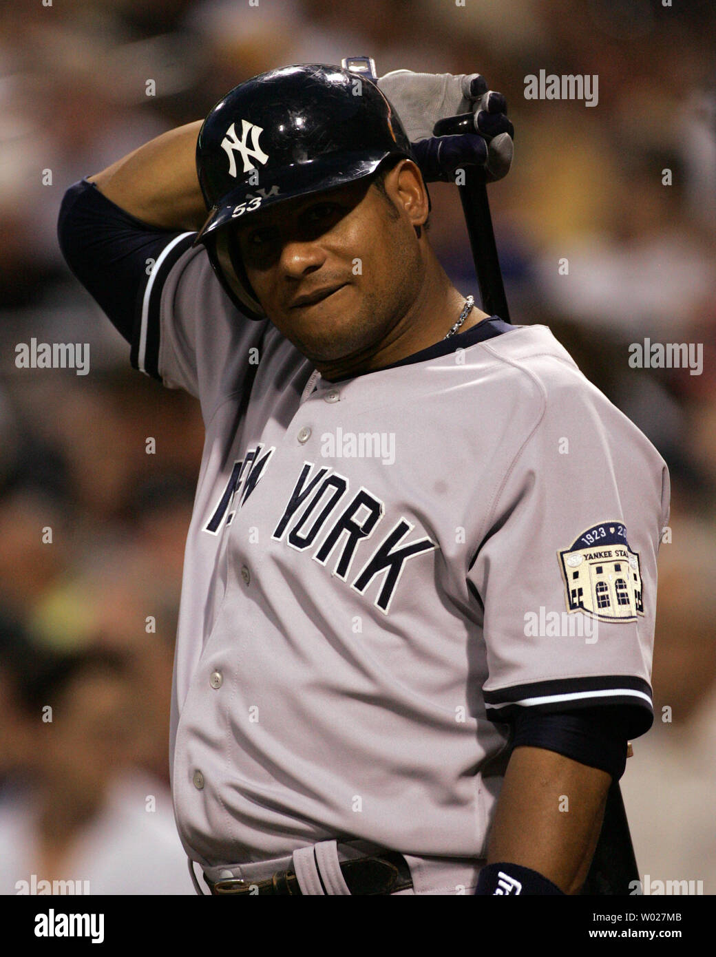 New York Yankees Bobby Abreu loosens up before batting in the sixth ...
