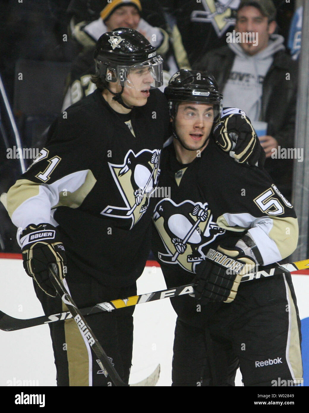 Pittsburgh Penguins Kris Letang (58) celebrates with teammate Evgeni ...