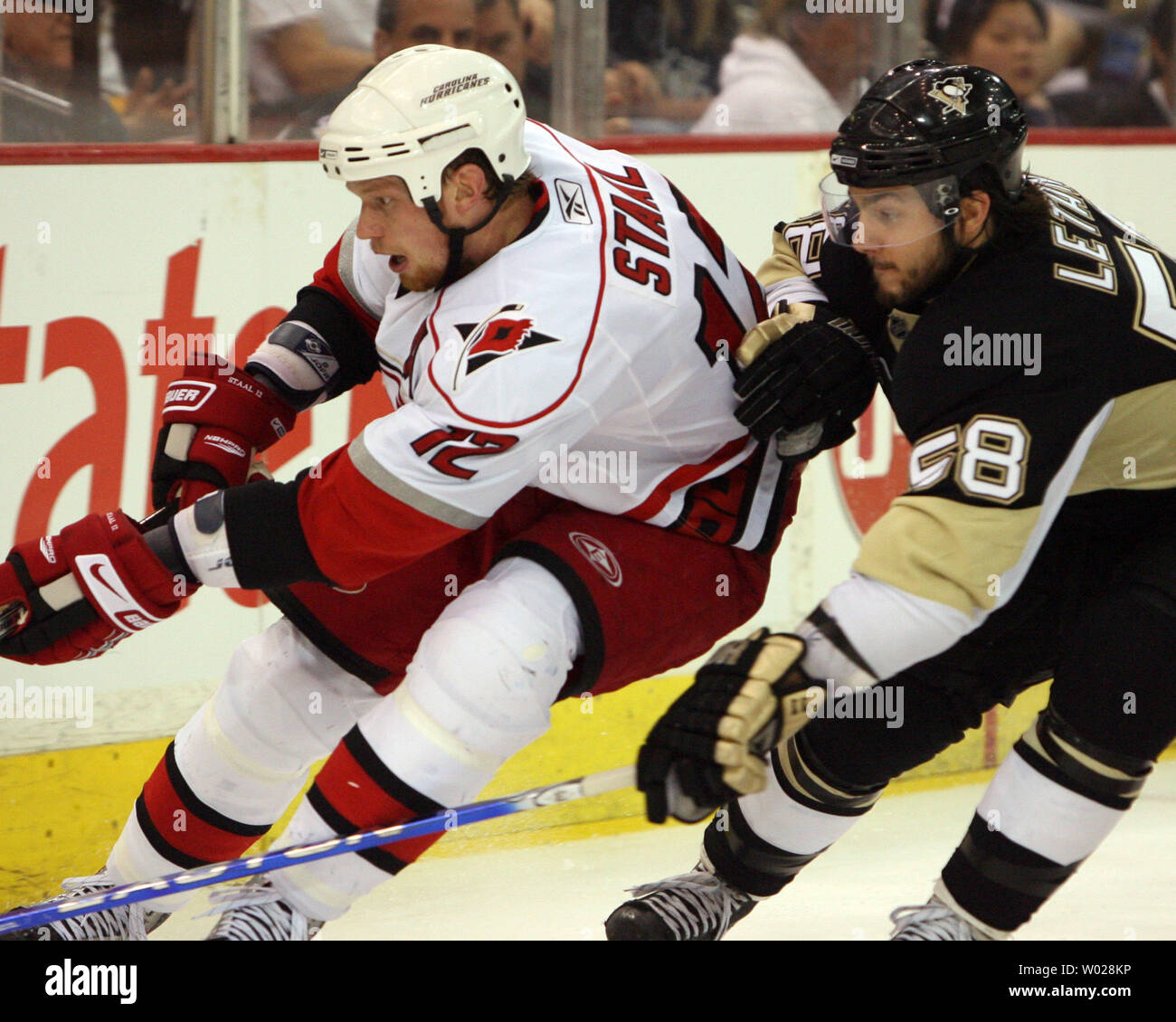 Pittsburgh Penguins Kris Letang (58) and Carolina Hurricanes Eric Staal ...