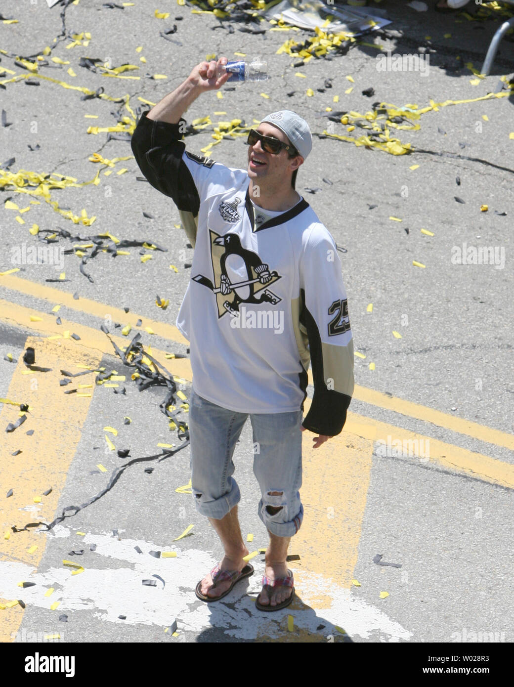 Pittsburgh Penguins Maxime Talbot walks the parade route and ...