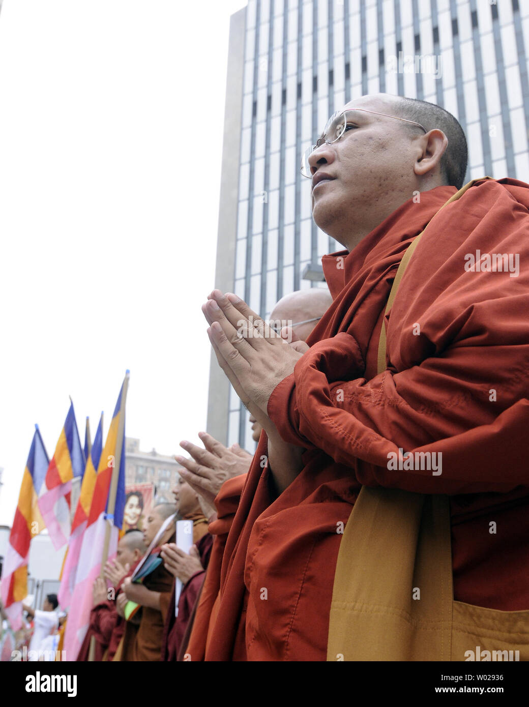 Monks from the International Burmese Monk Organization finishes their ...