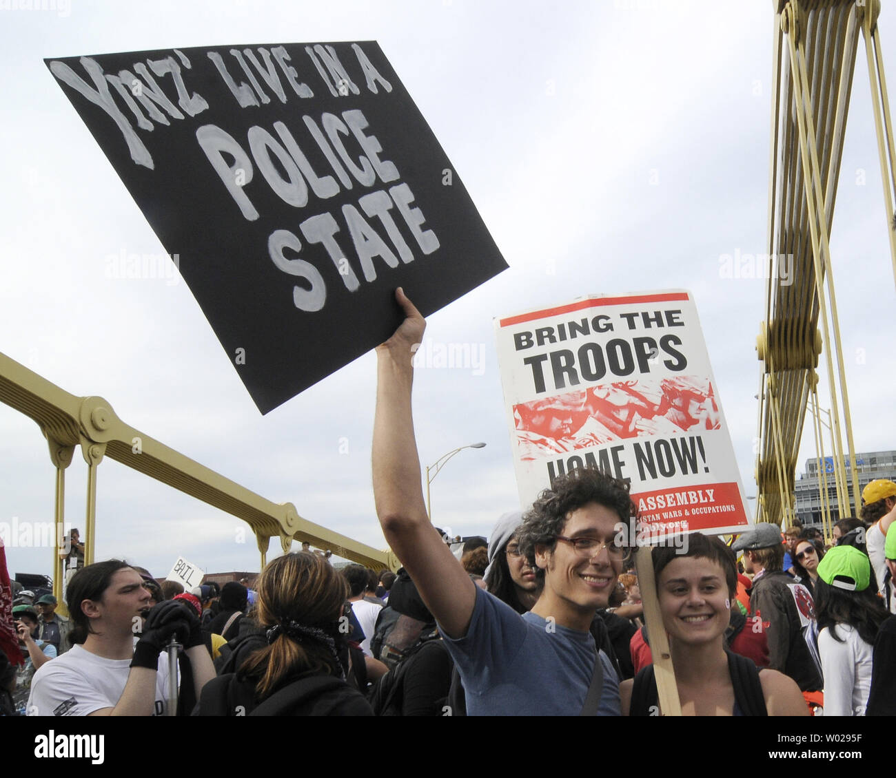 Marchers protest "The People's March to the G20" as it makes it's way ...