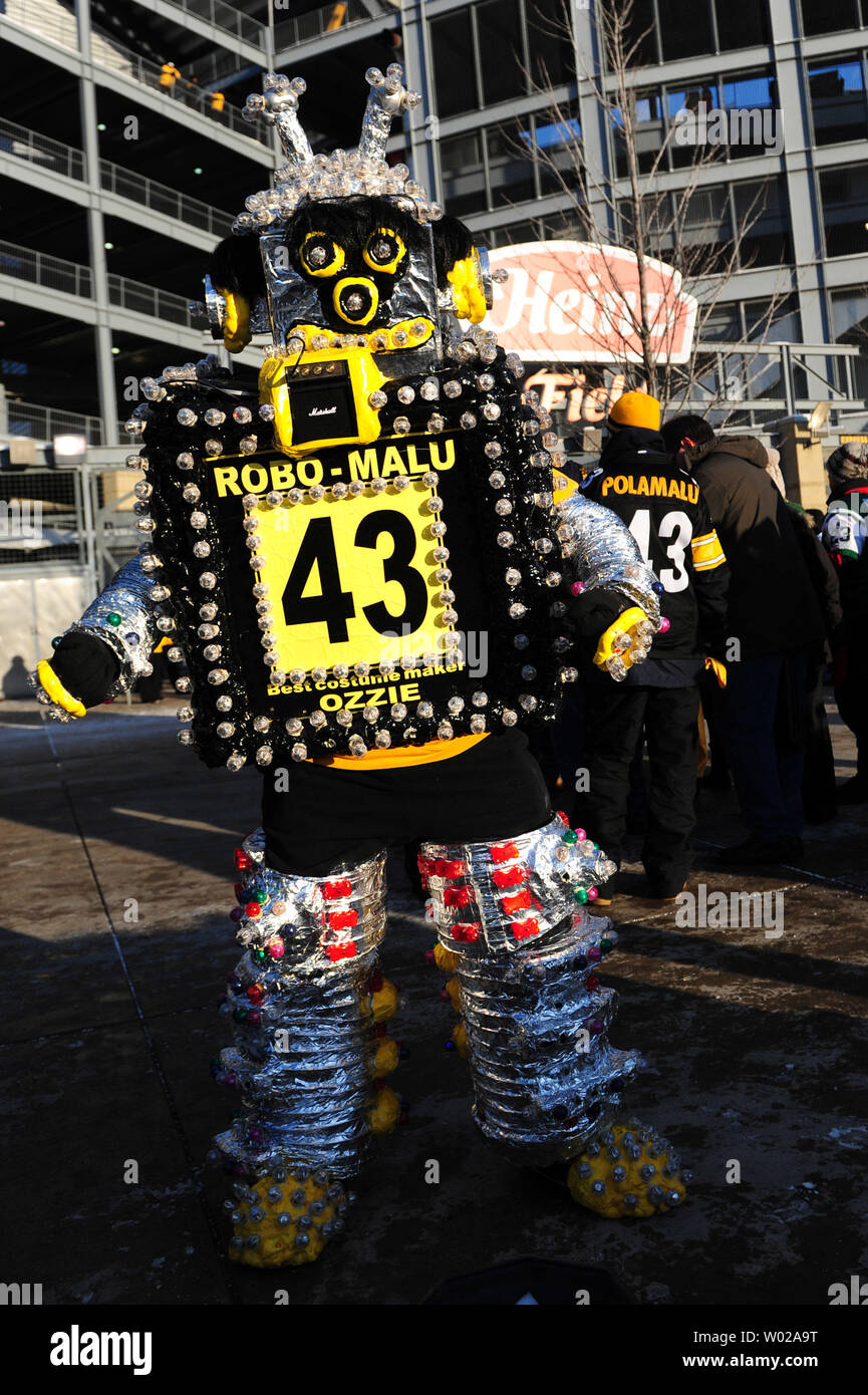 Jeff Elliott dressed as a robot Troy Polamalu poses for a photo outside ...