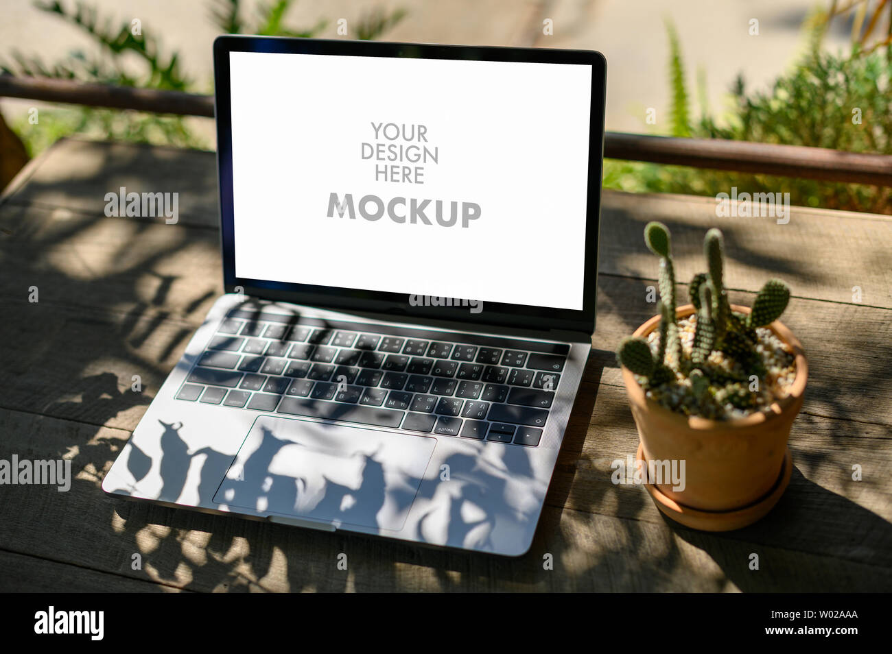 Mockup of business man using laptop screen for your advertising text ...