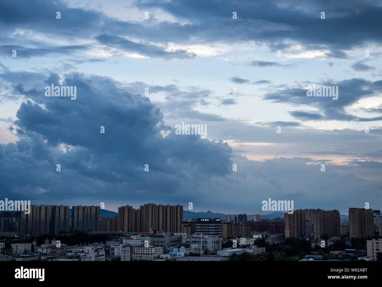 The wind rises and the clouds roll up Stock Photo - Alamy