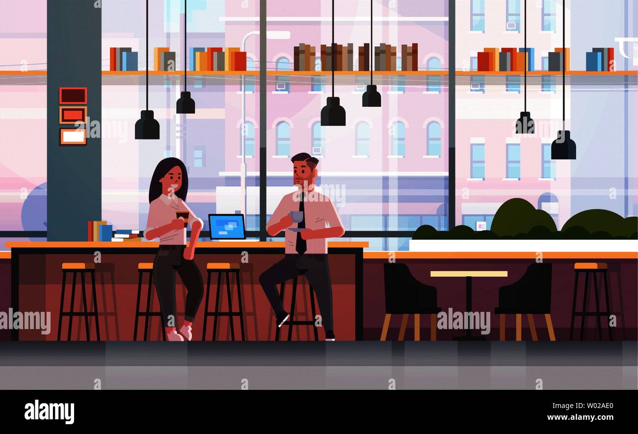 Couple Sitting On Chair At Bar Counter With Laptop Coffee Break Concept